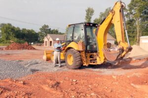 Backhoe Cost: New vs. Used vs. Rent With Examples (2025 Comparison ...